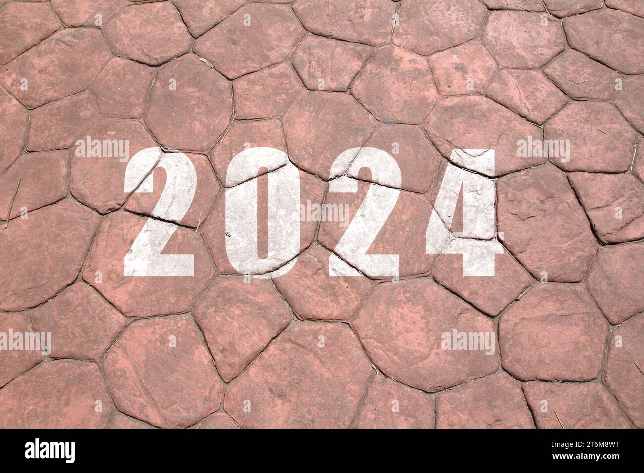 New year 2024. Text of 2024 has written on the ground Stock Photo - Alamy