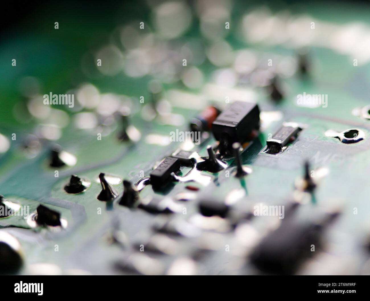 Green electronic circuit board close up. Macrophotograph Stock Photo - Alamy