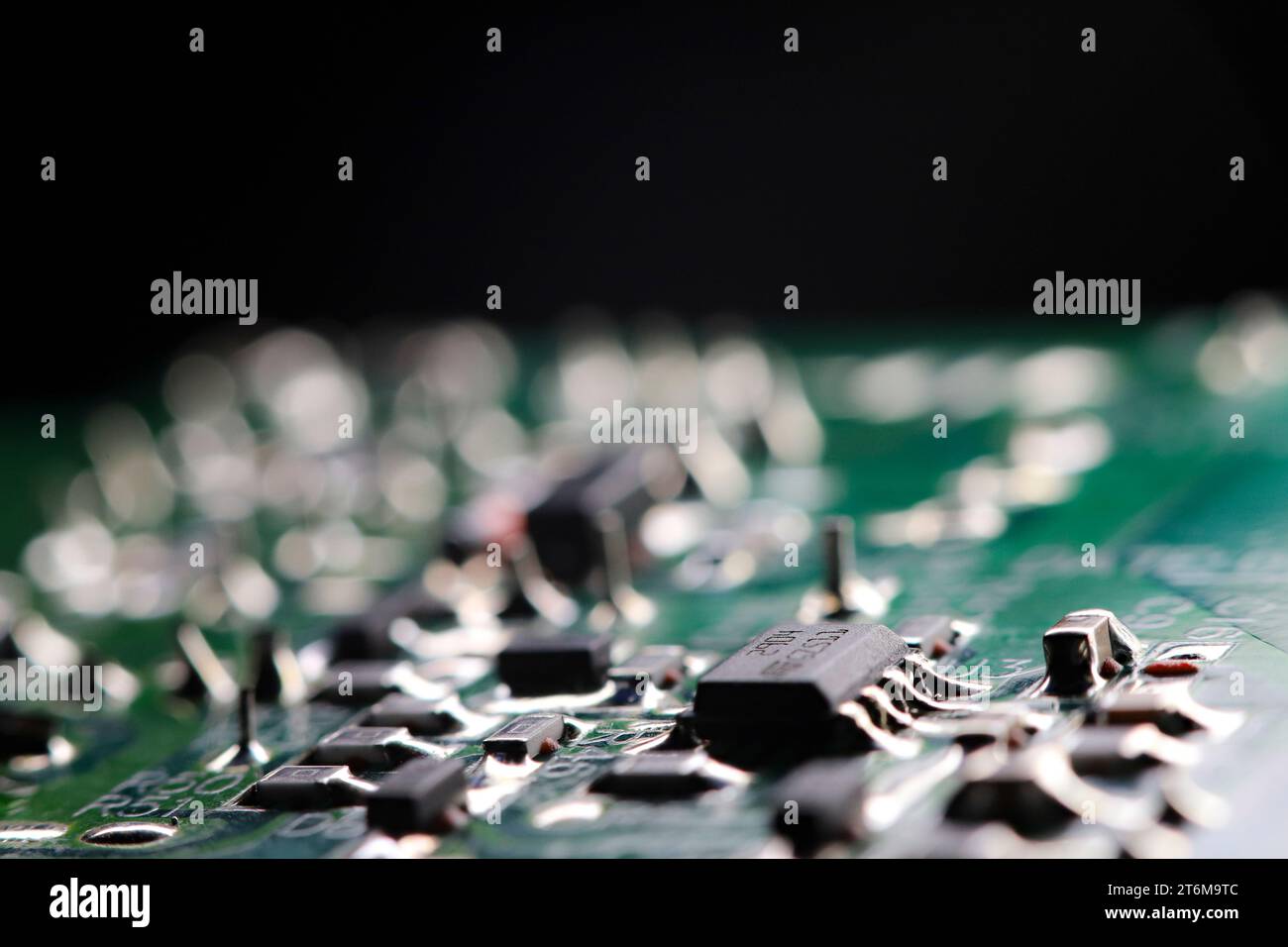 Green electronic circuit board close up. Macrophotograph Stock Photo - Alamy