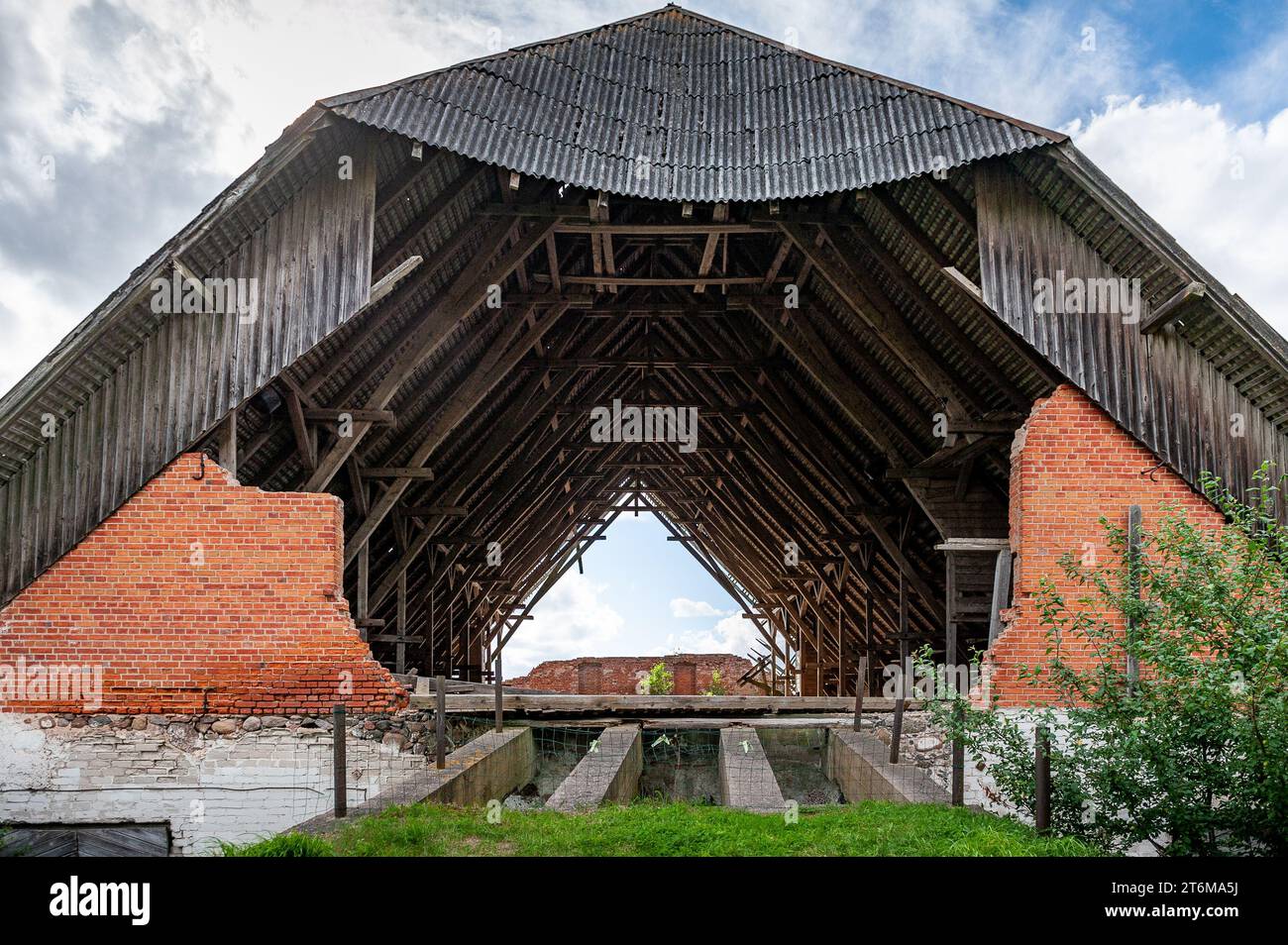 Abandoned Barn. Weathered and worn red barn on an abandoned farm ...