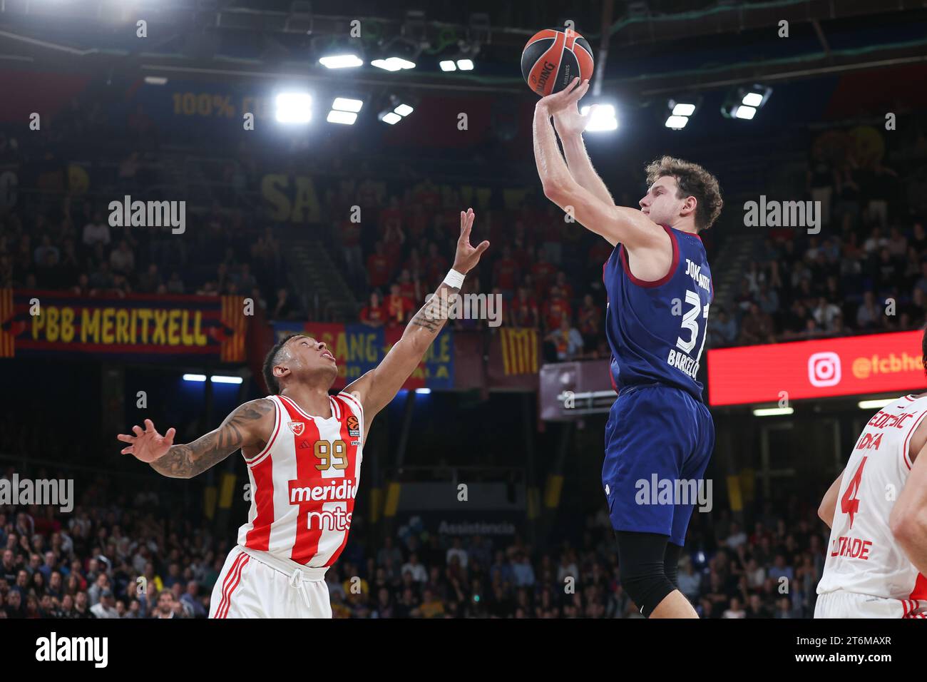 Rokas Jokubaitis of FC Barcelona in action with Yago Dos Santos of ...