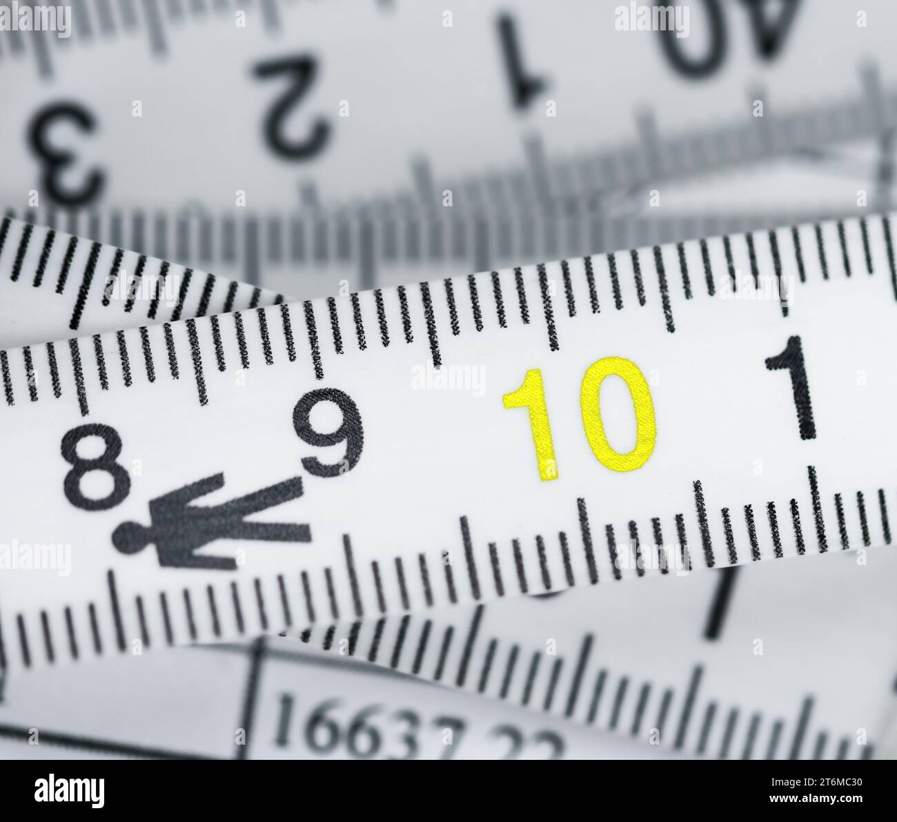 Marking rulers, white tape measure macro Stock Photo - Alamy