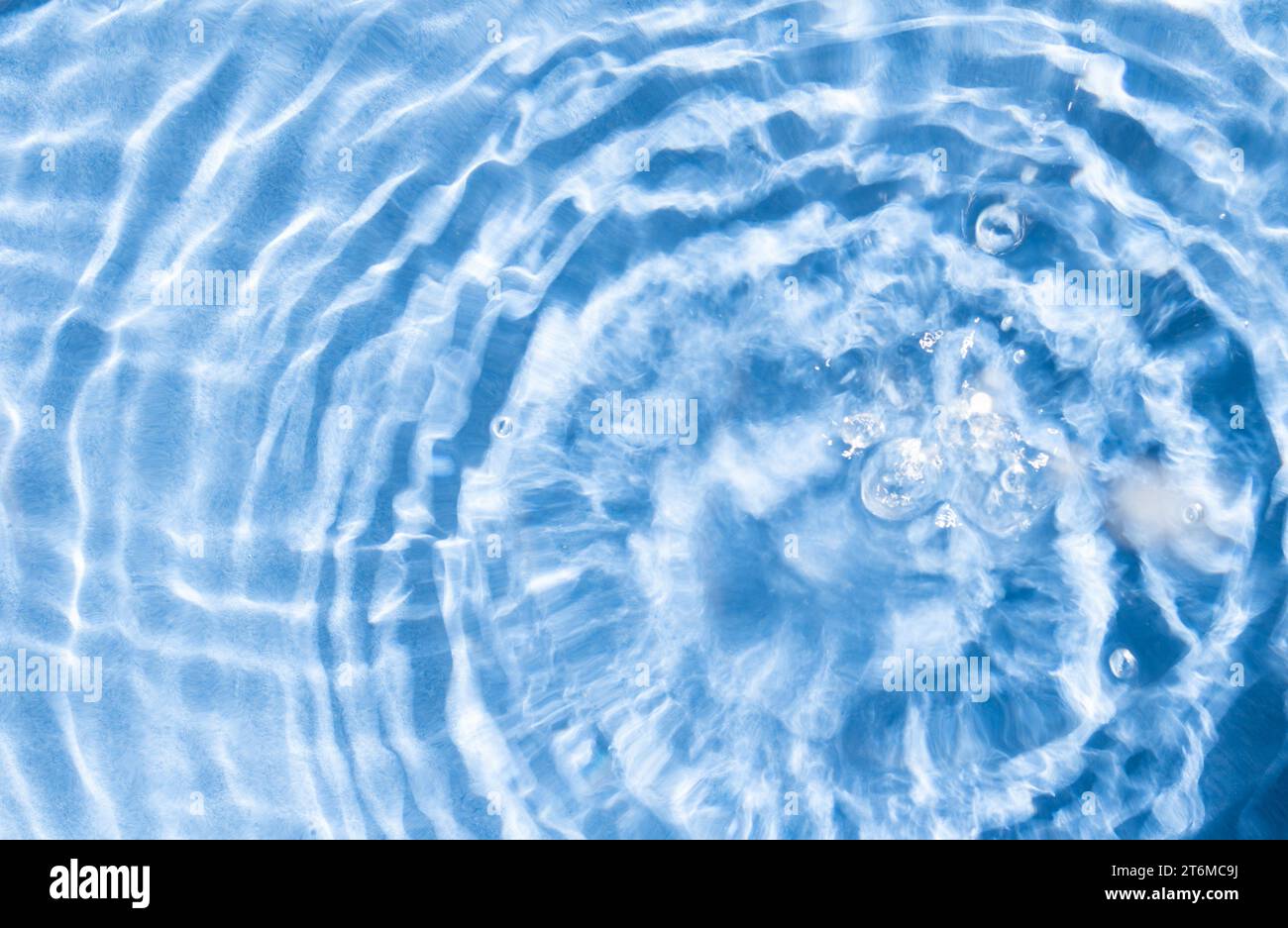 Circle sun reflections in pool water from above Stock Photo - Alamy