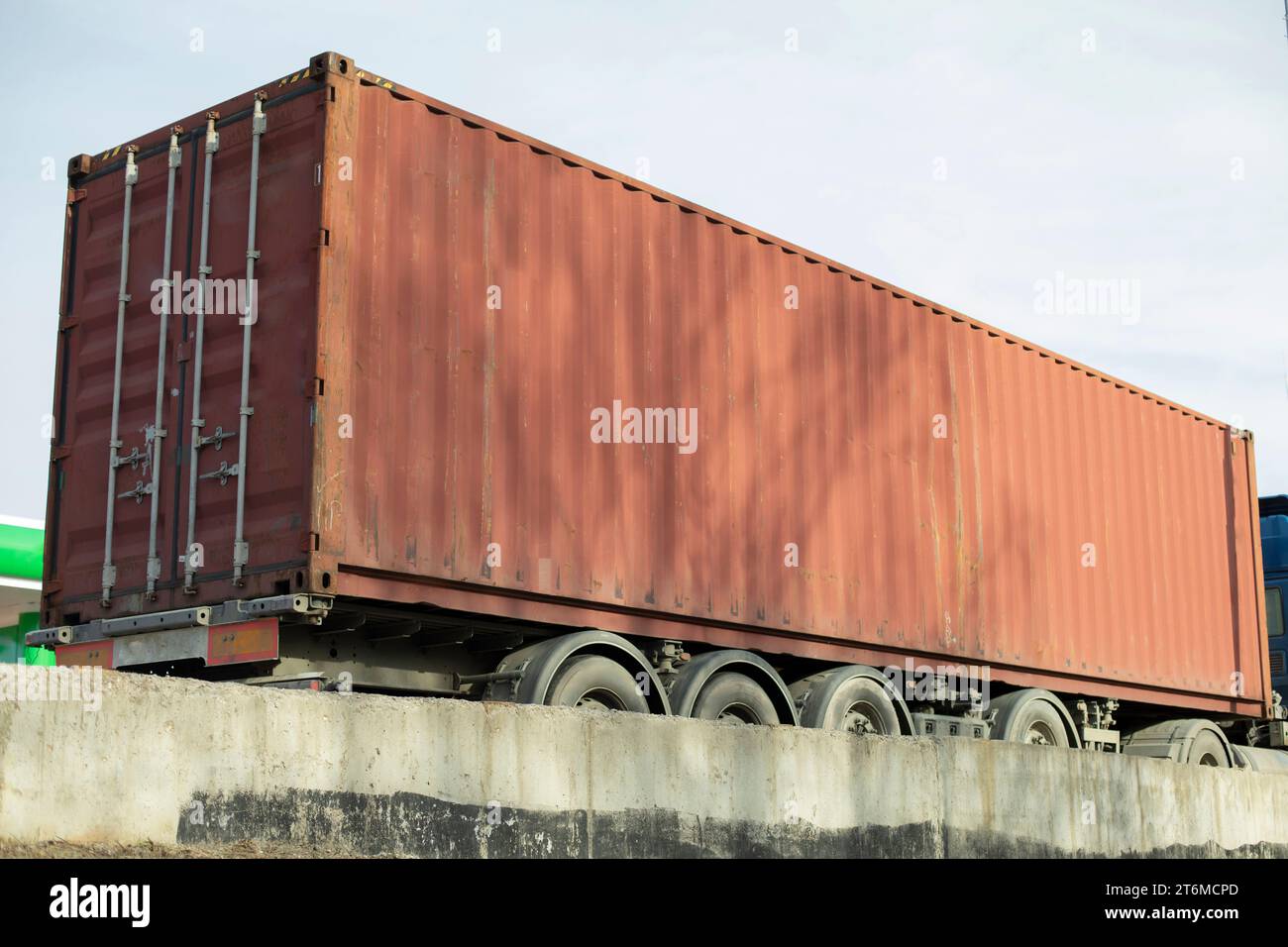 Container on truck. Transportation of goods by road. Large container of ...