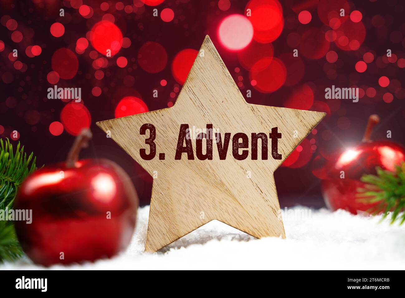 10 November 2023: Wooden star in festive red surroundings with the ...