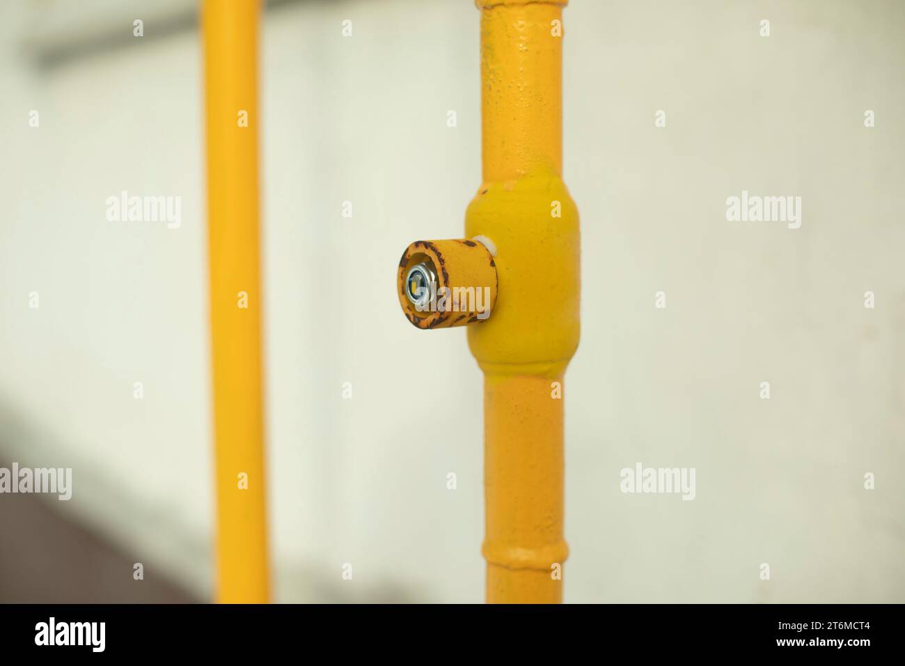 Gas pipe on house. Yellow pipe. Gas supply to building. Infrastructure ...