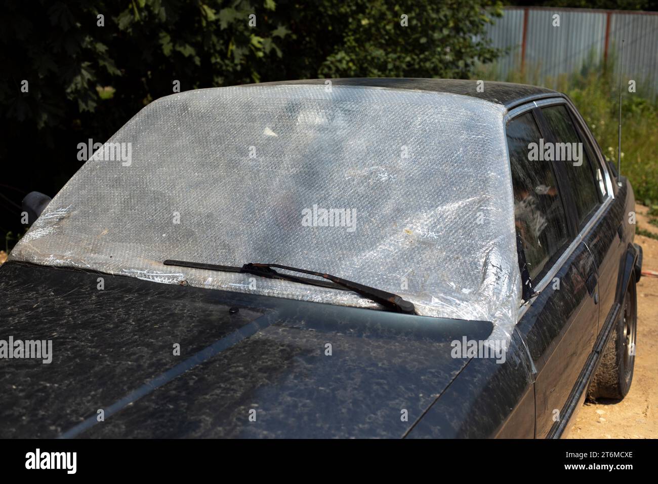 Machine without front window. No glass in car. Broken window in ...