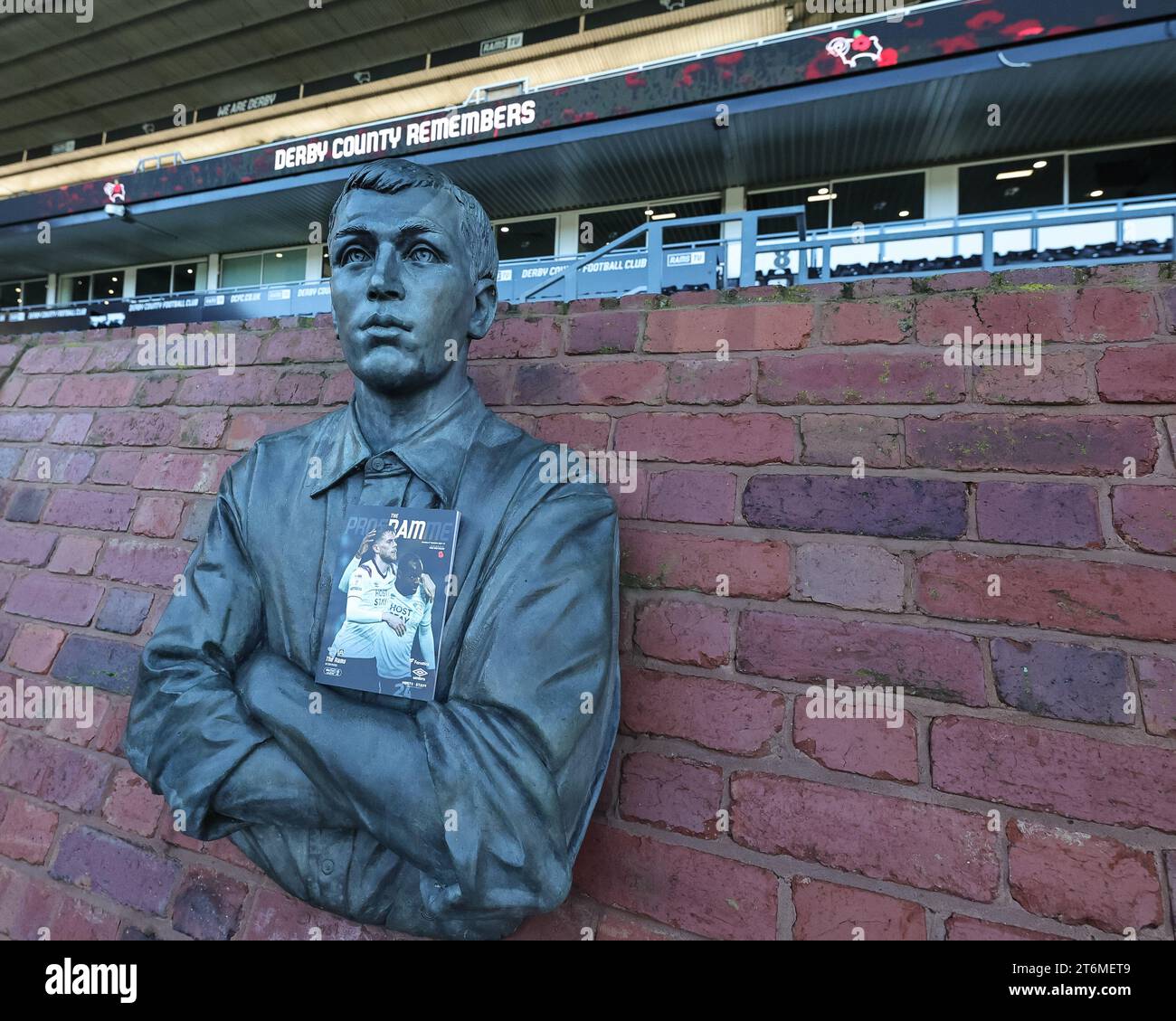Steve Bloomer statue and todays match day program during the Sky Bet ...