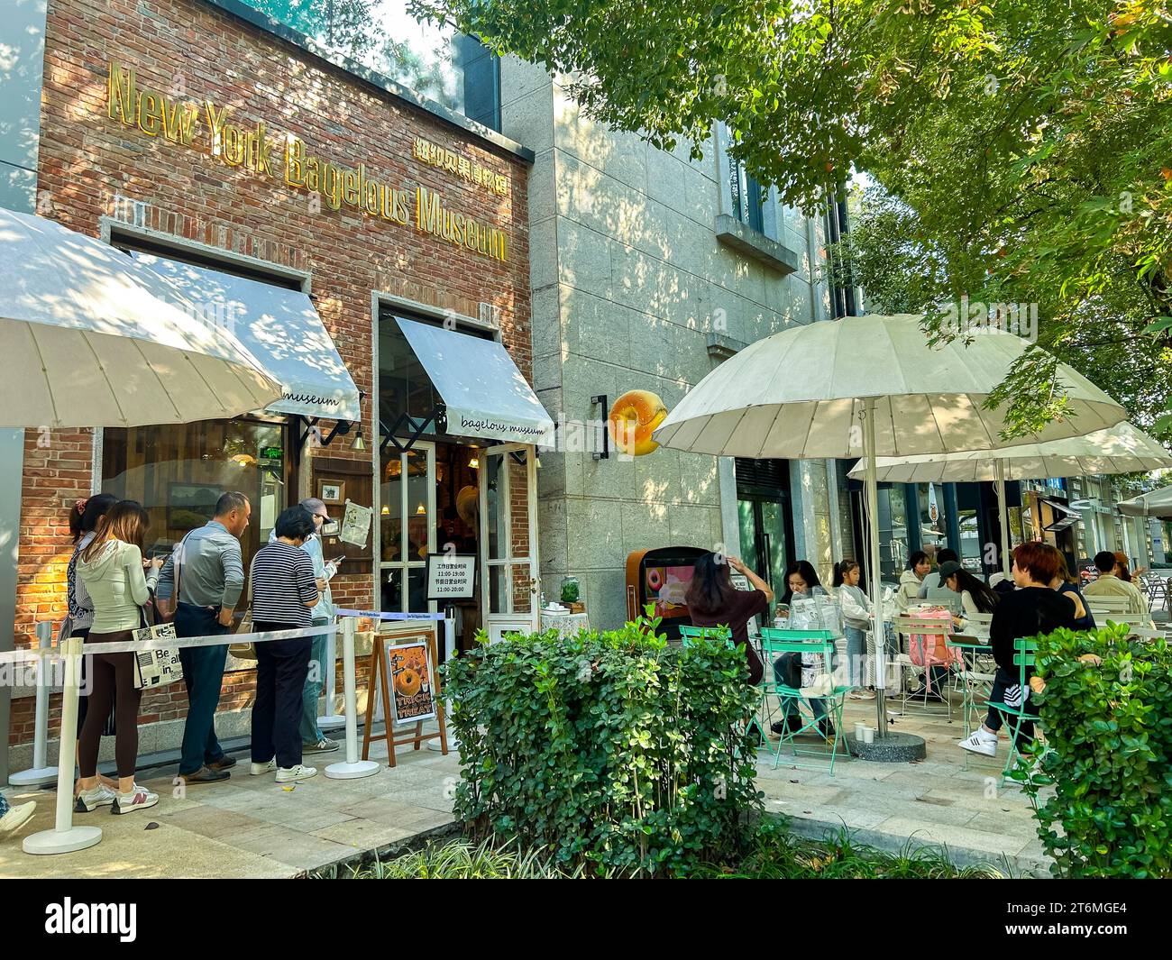 Shanghai, China, Crowd of people on street terraces , in Chinese ...