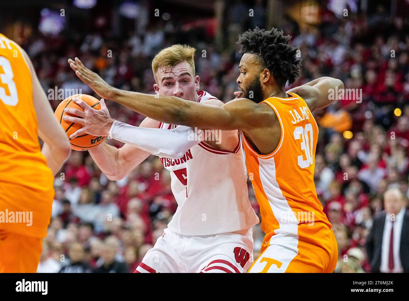 Wisconsin's Tyler Wahl (5) against Tennessee's Josiah-Jordan James (30 ...