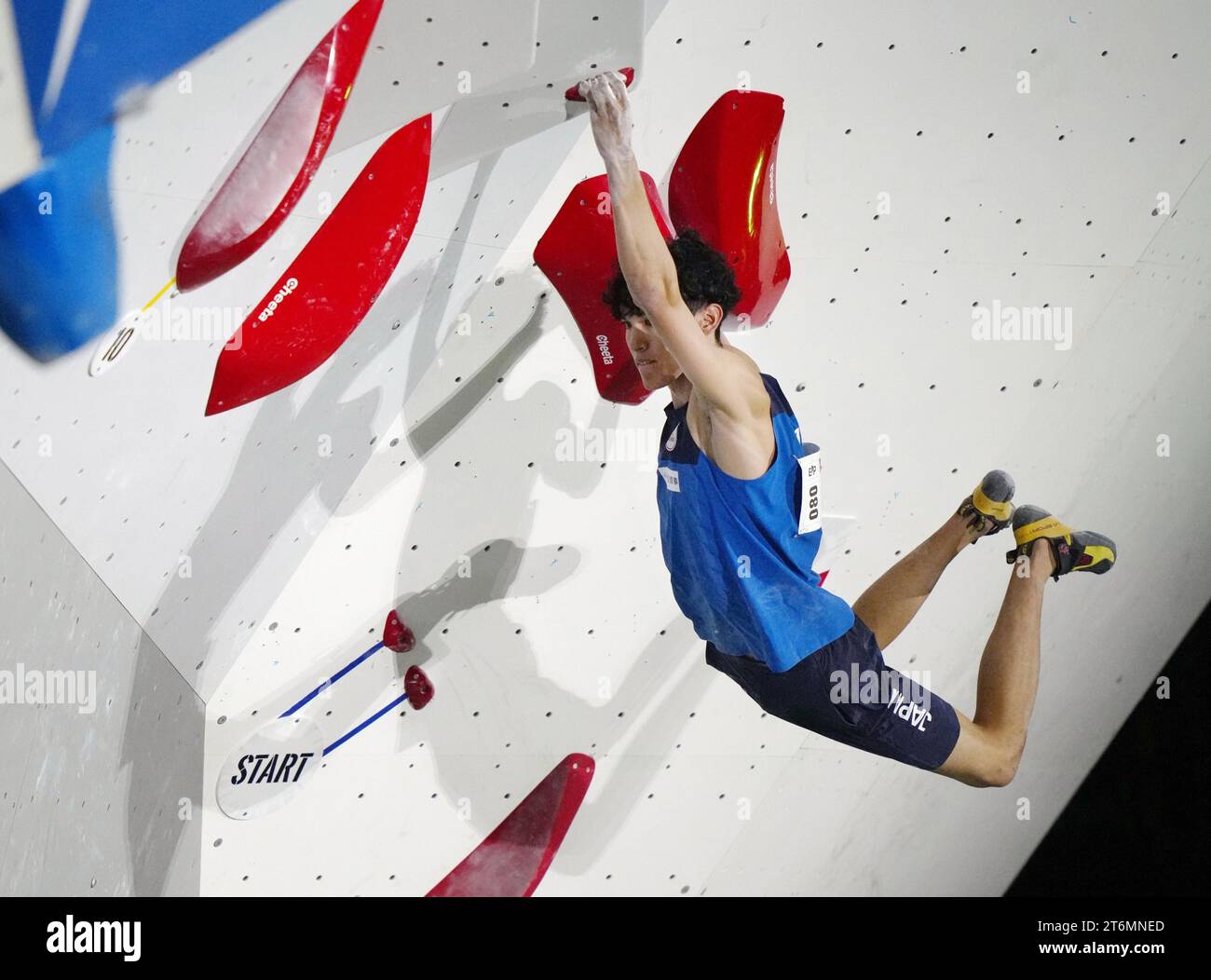 Meichi Narasaki of Japan competes in the boulder discipline of the men ...