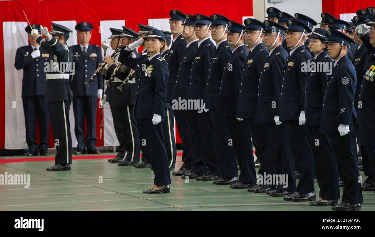 Member of the Air Self-Defense Force salute during a review of the Air ...