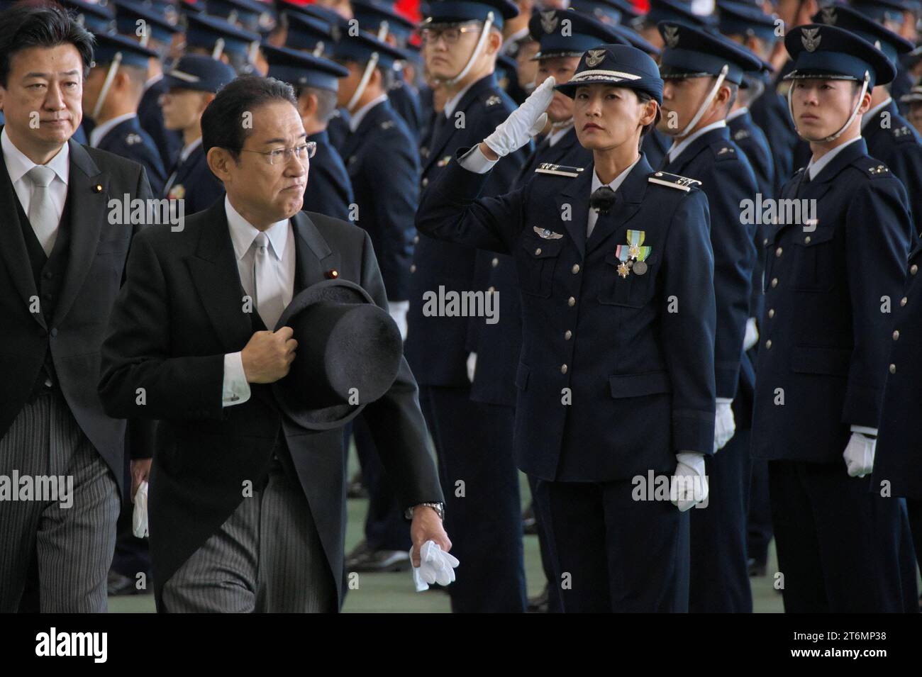 Japan's Prime Minister Fumio Kishida receives the salute of a guard of ...