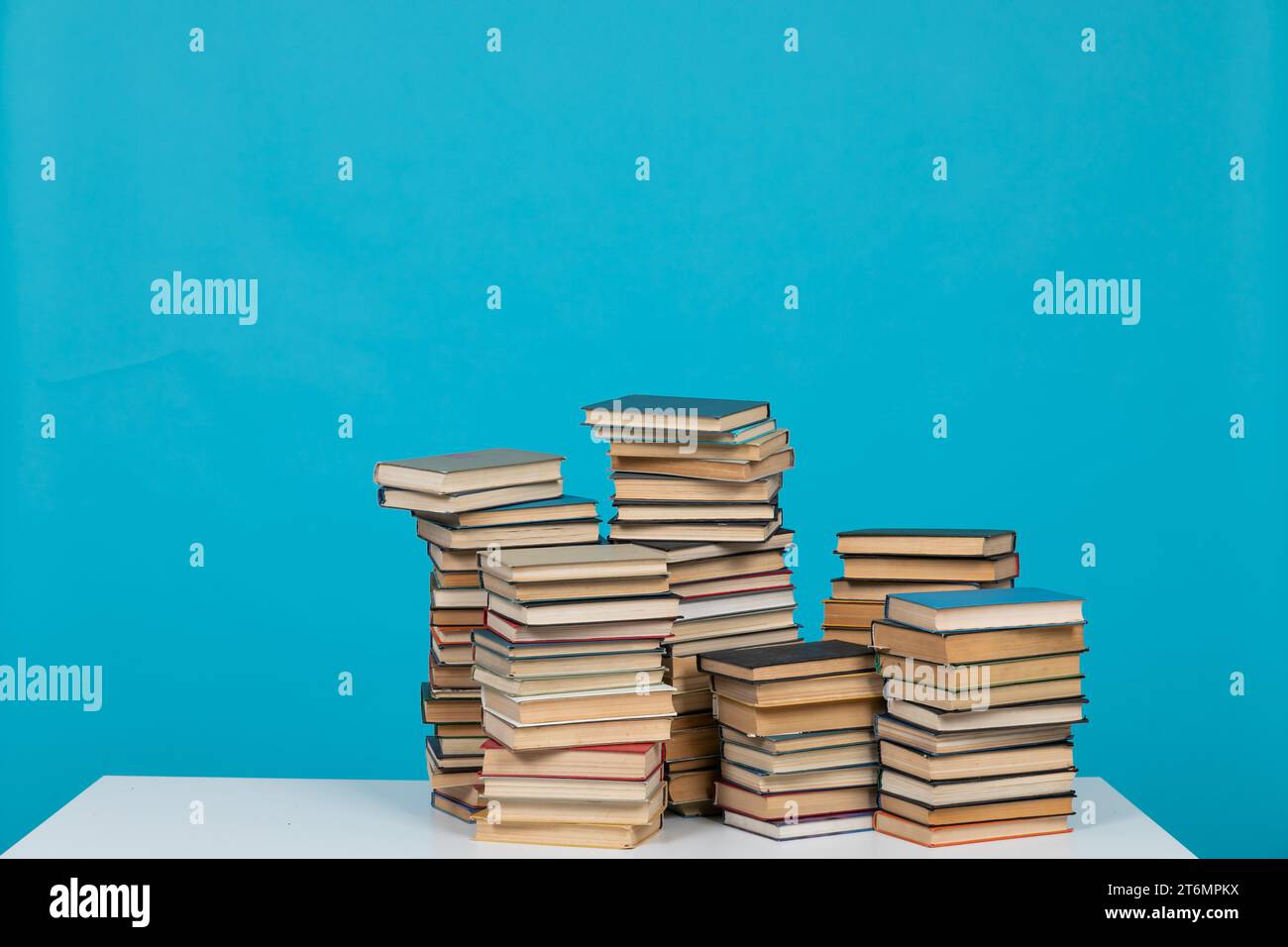 science education stack of books on a blue background teaching literacy ...