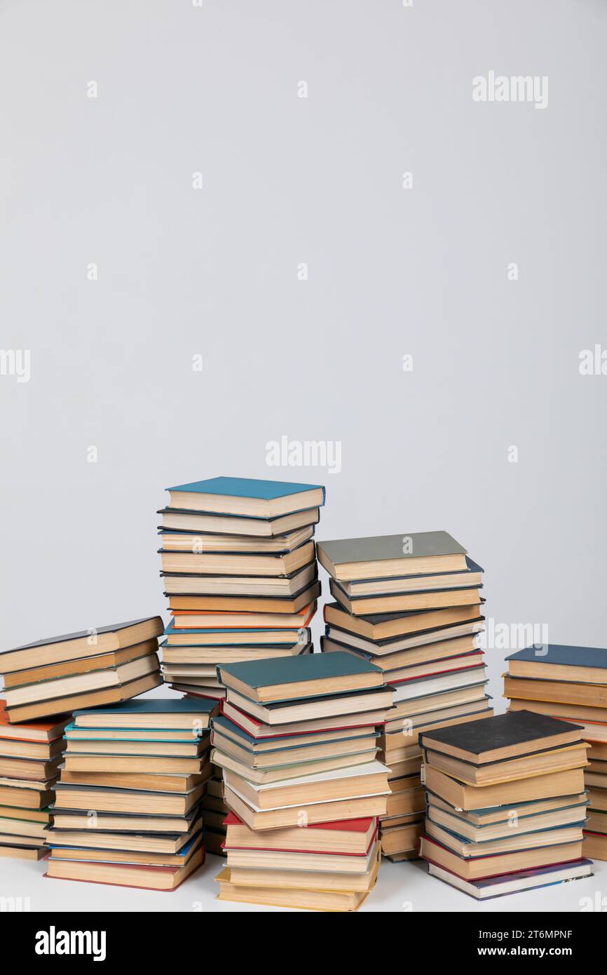 science education stack of books on white background teaching literacy ...