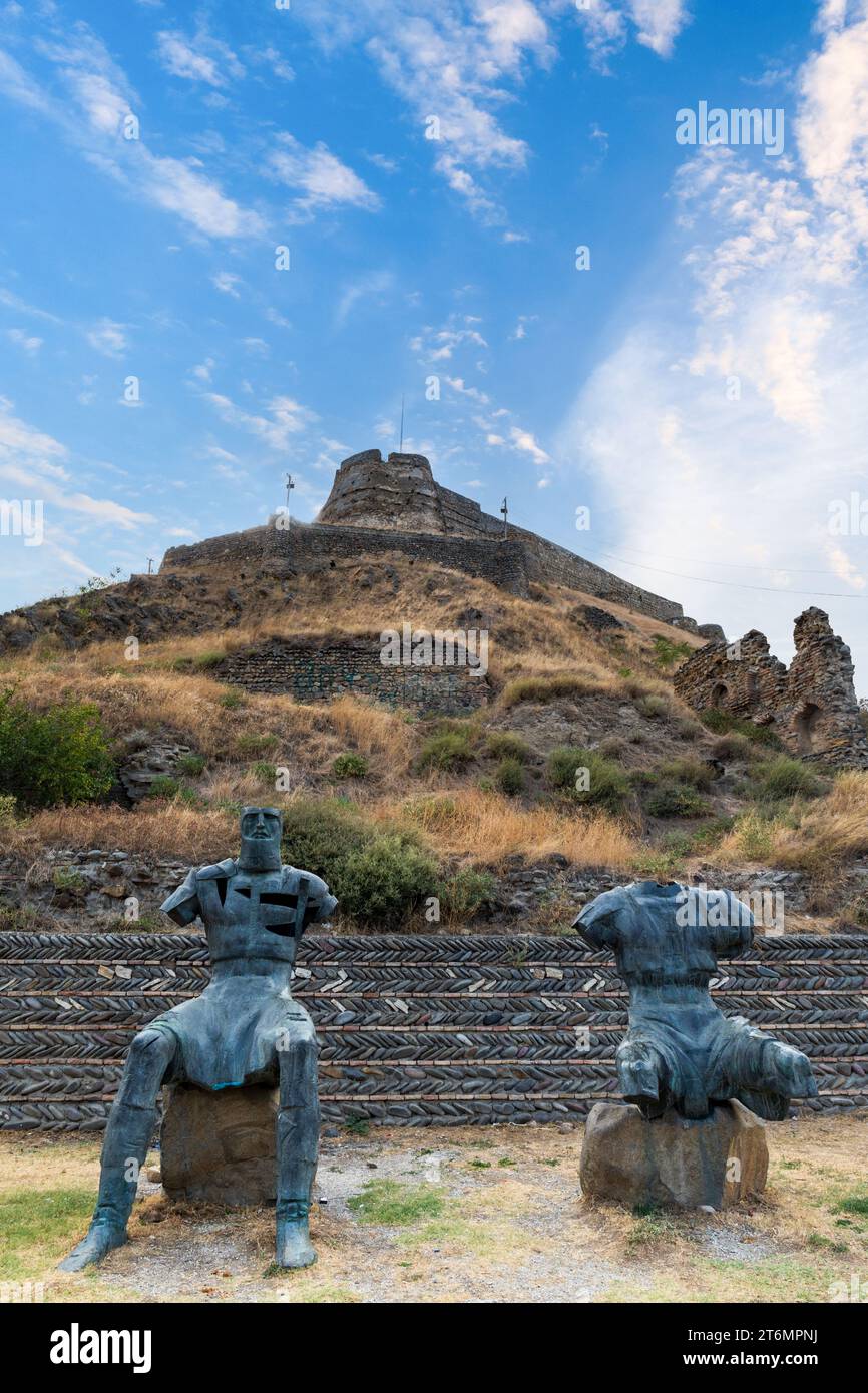 Gori historic Castle ruin and statues in Gori, Georgia. The ancient ...
