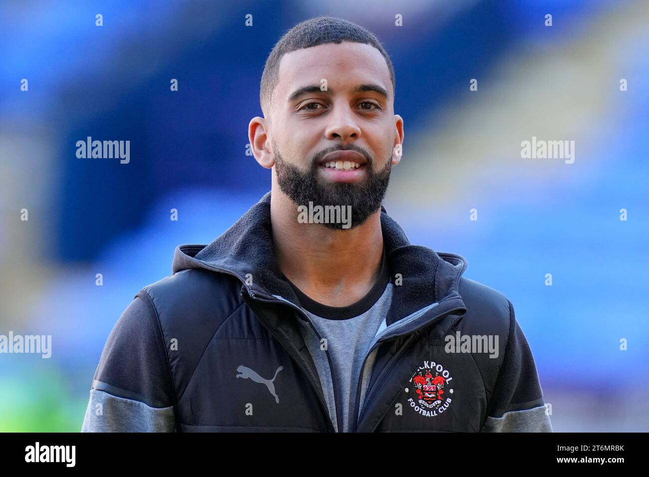 CJ Hamilton #22 of Blackpool inspects the pitch before during the Sky ...