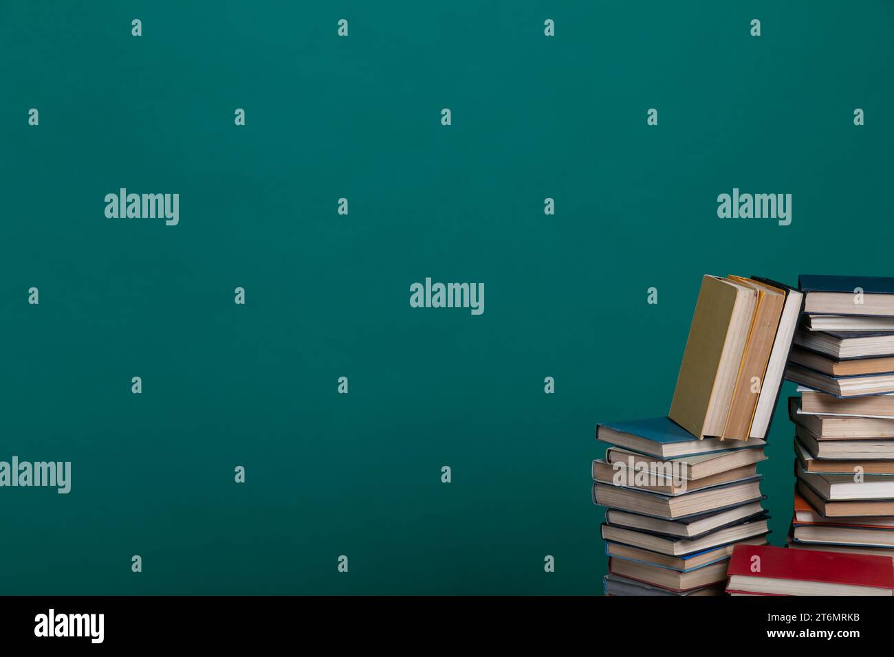 science education stack of books on a green background learning ...