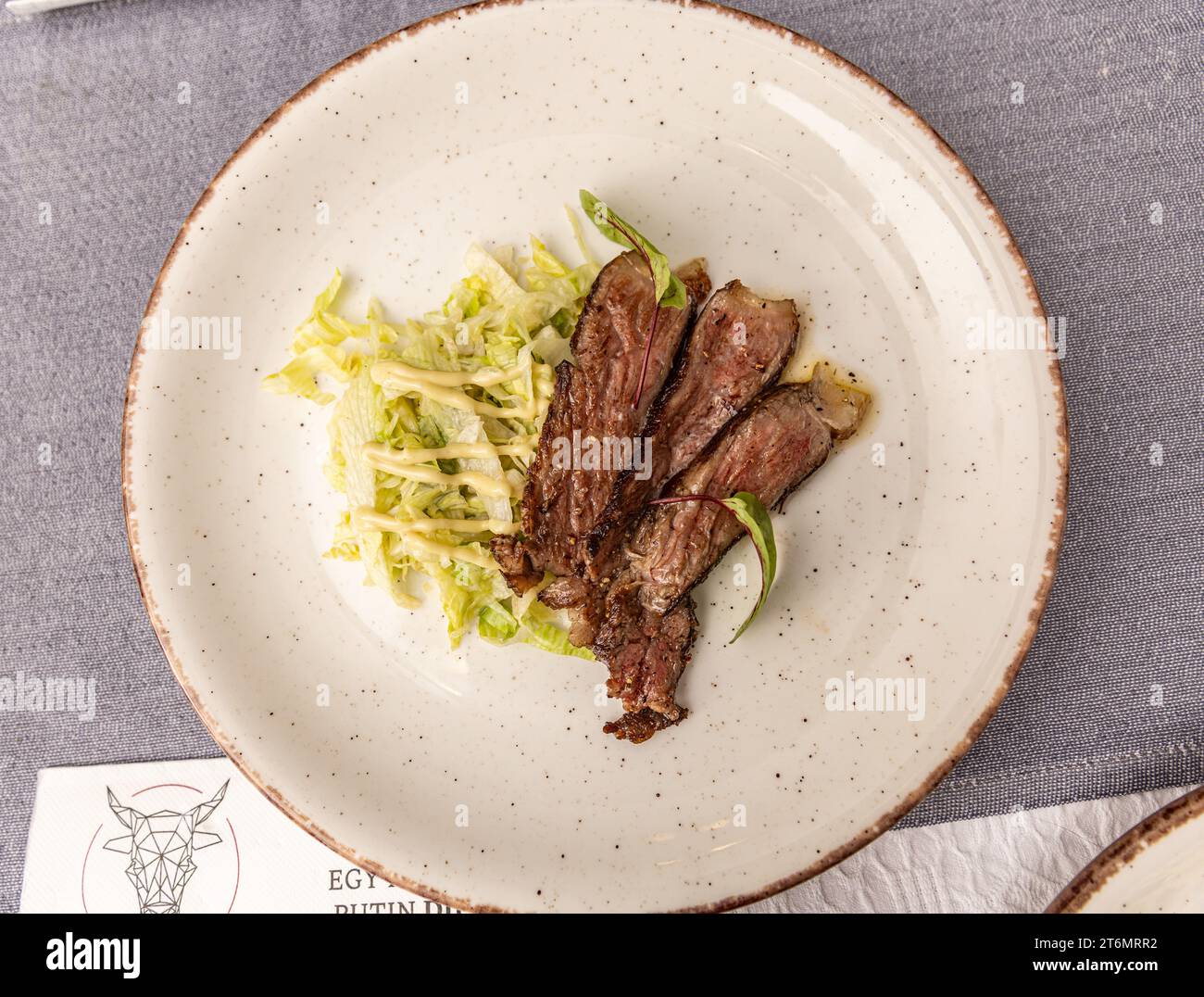 Top view of delicious meal fresh lettuce with perfectly cooked sliced ...