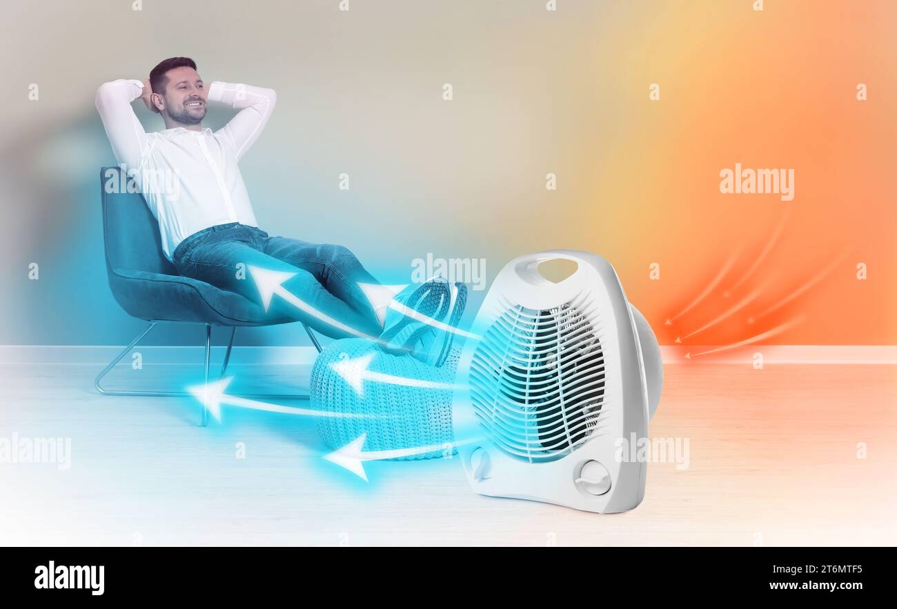 Heat control and energy saving. Man relaxing in room with electrical ...