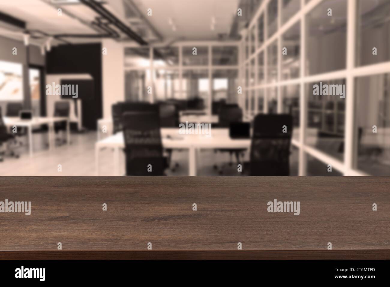 Empty wooden table in comfortable office. Space for design Stock Photo ...