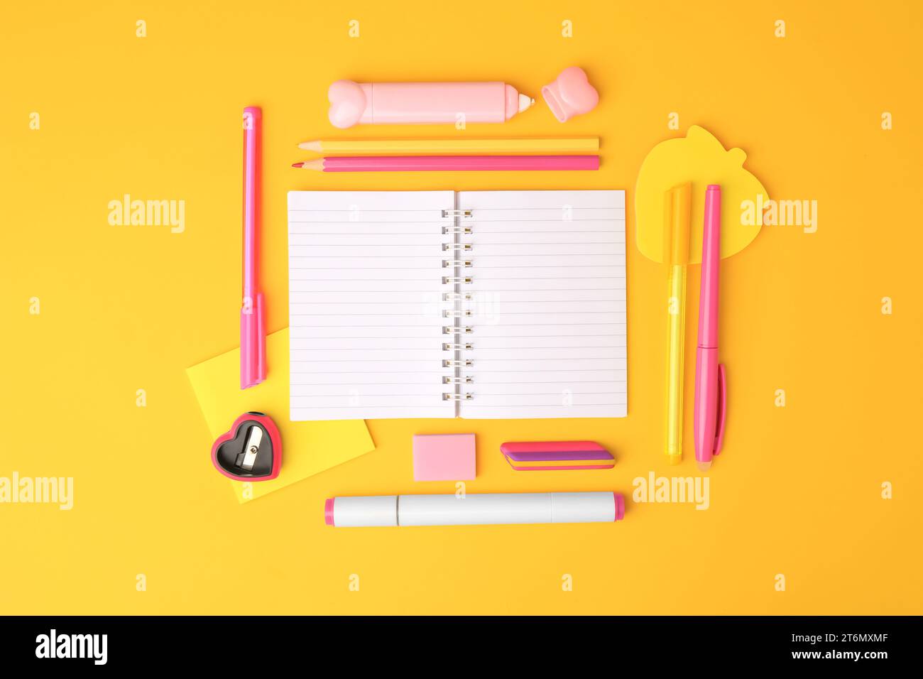 Flat lay composition with open notebook and different school stationery ...