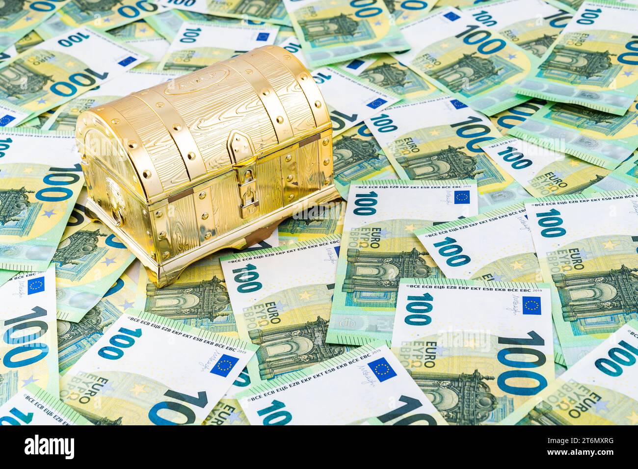 Golden chest on many 100 euro banknotes as background, Pandora chest ...