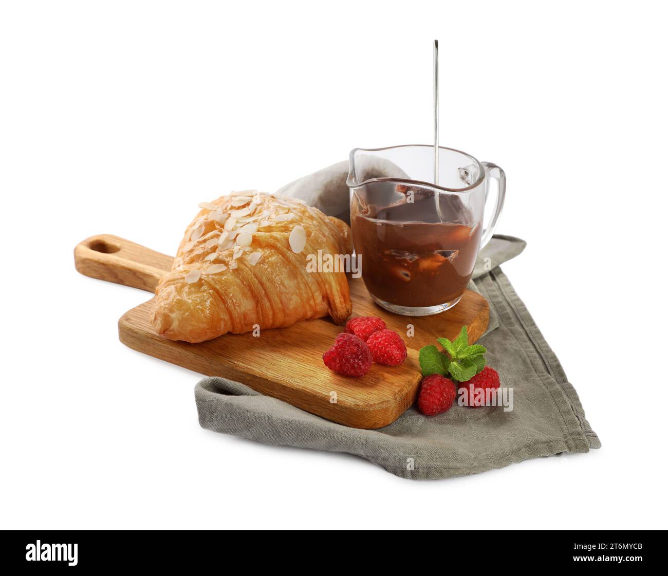 Delicious croissant with almond flakes, chocolate and raspberries ...