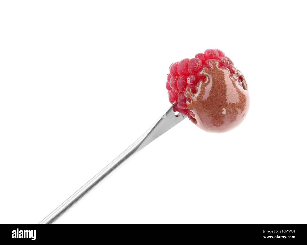 Raspberry with melted chocolate isolated on fondue fork against white ...