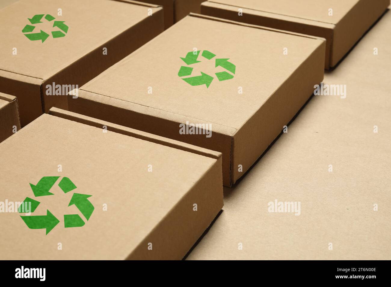 Cardboard boxes with recycle sign stamps on paper Stock Photo - Alamy