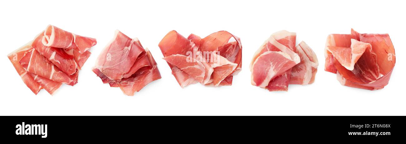 Delicious sliced jamon isolated on white, set Stock Photo - Alamy