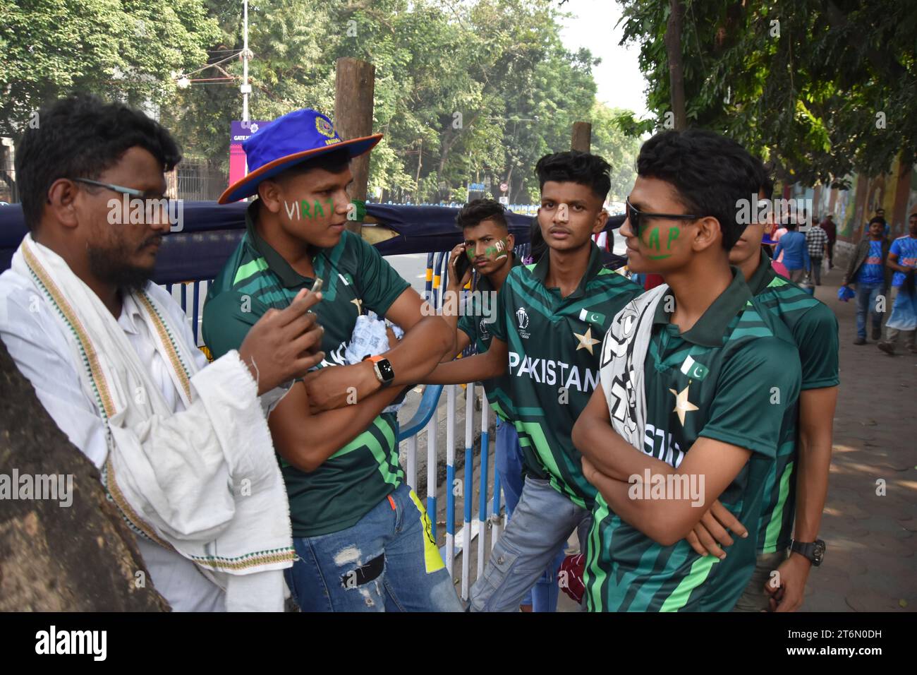 Cheerful spectators entering into the Eden Gardens stadium in Kolkata ...