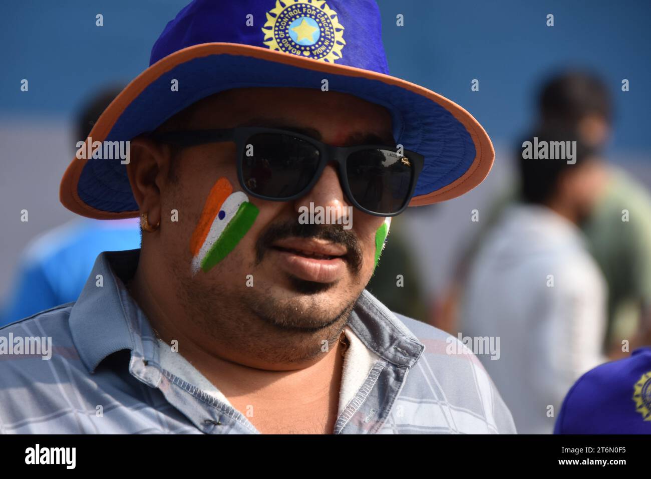 Cheerful spectators entering into the Eden Gardens stadium in Kolkata ...