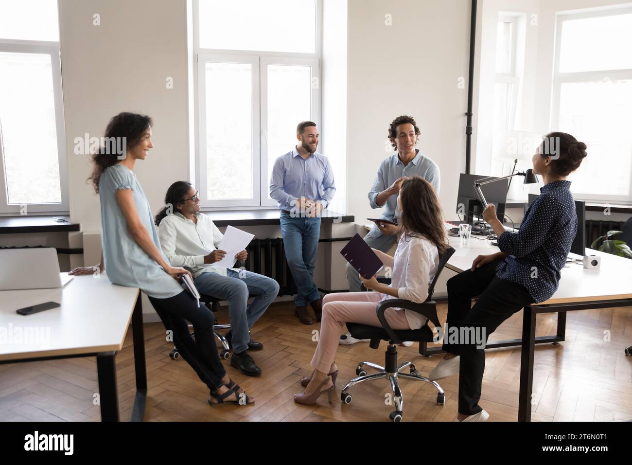 Happy diverse female teacher talking hi-res stock photography and ...