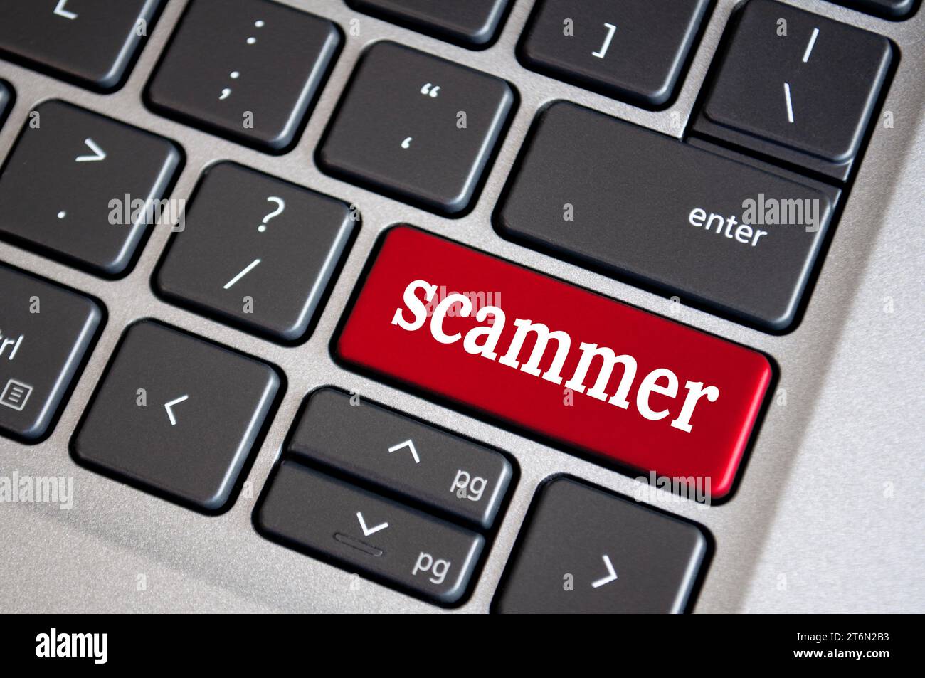 Scammer text on red color keyboard. Security and cyber attach concept ...
