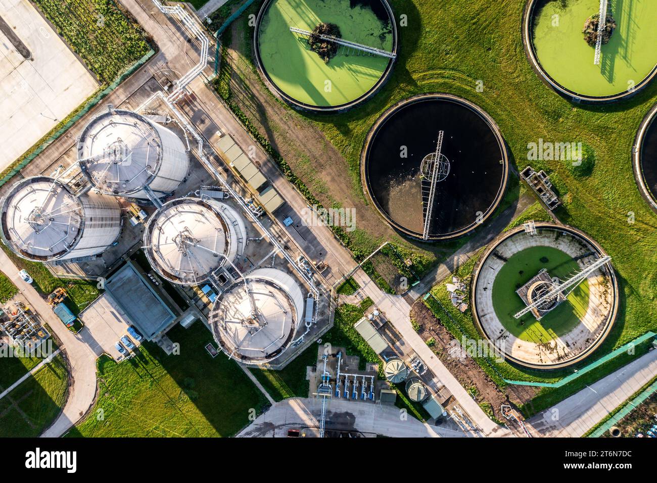 An aerial view directly above a waste water treatment works with ... An aerial view directly above a waste water treatment works with ...
