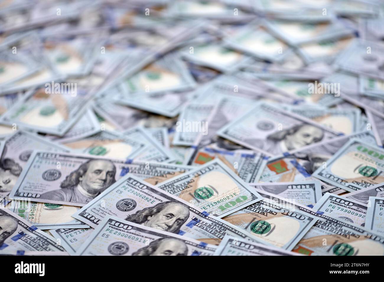 Very big amount of US hundred dollar bills close up. Huge quantity of ...