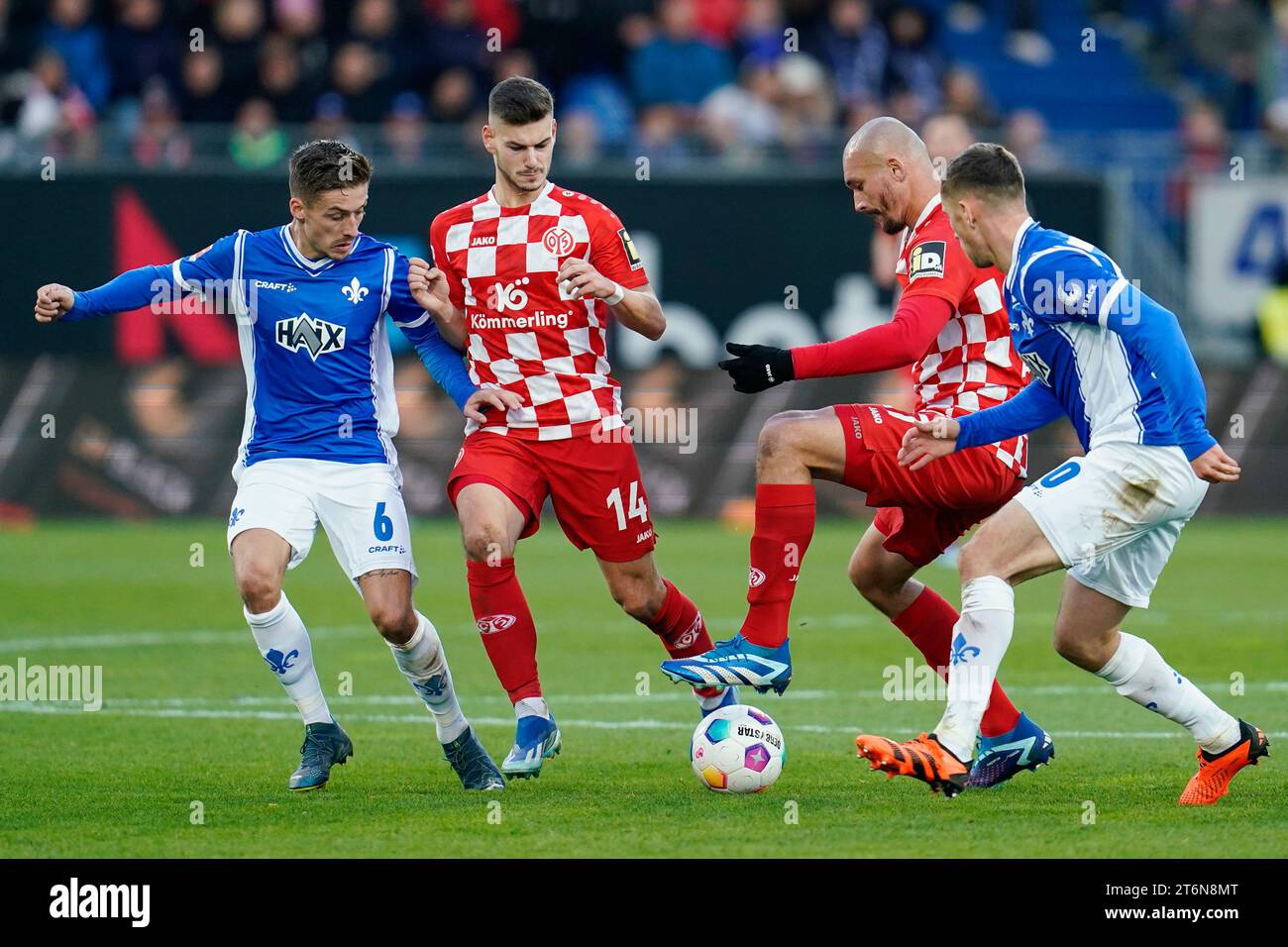 From left, Darmstadt's Marvin Mehlem, Mainz's Tom Kraus, Mainz's ...