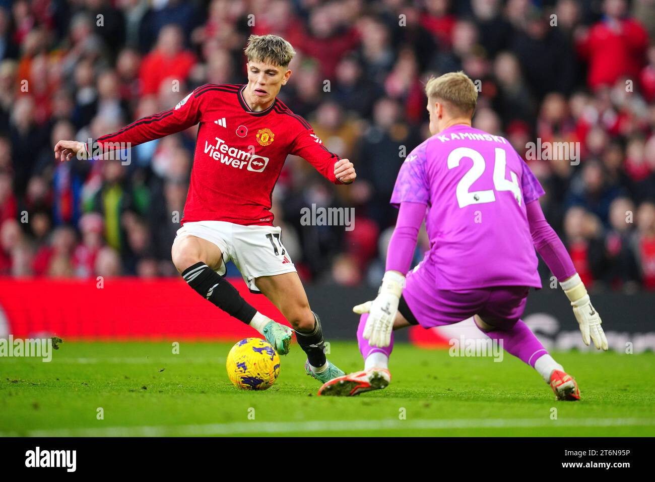 Manchester United's Alejandro Garnacho, left, challenges for the ball ...