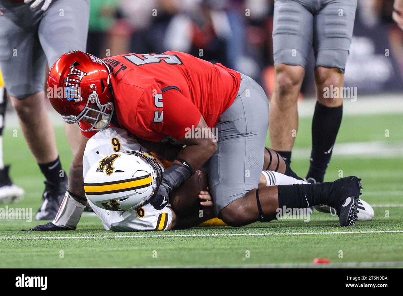 November 10, 2023: UNLV Rebels defensive lineman Jalen Dixon (50) sacks ...