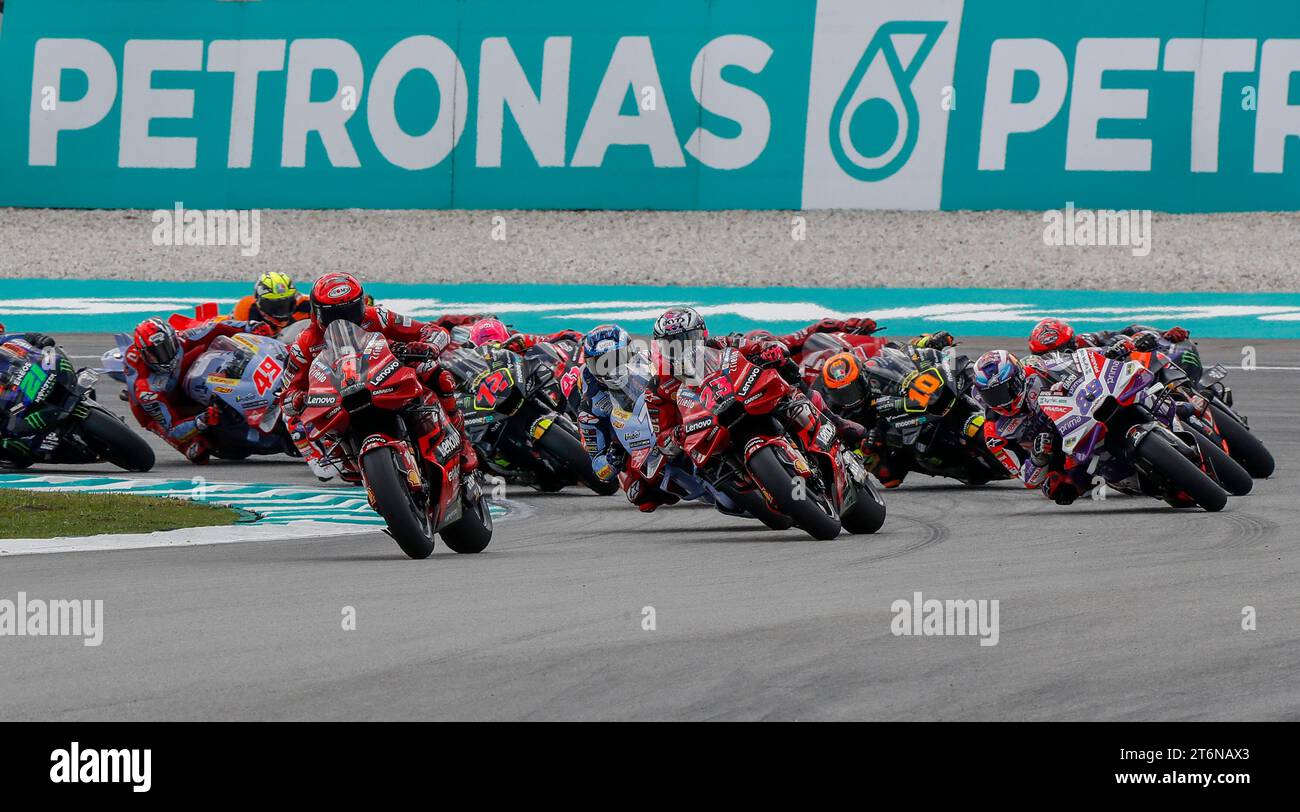 Italian rider Francesco Bagnaia of Ducati Lenovo Team leads the pack ...