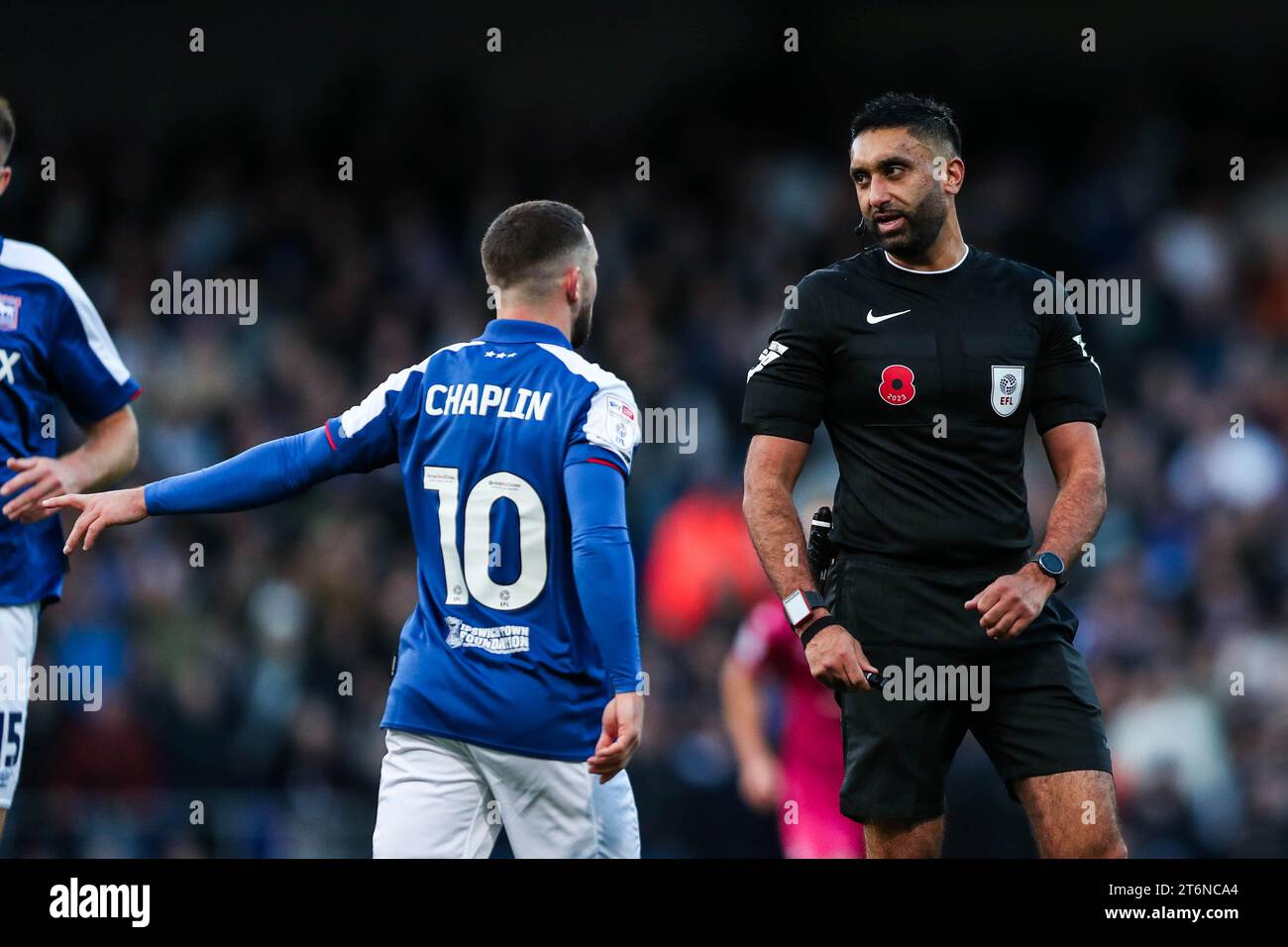 Referee Sunny Gill talks to Ipswich Town's Conor Chaplin during the Sky ...