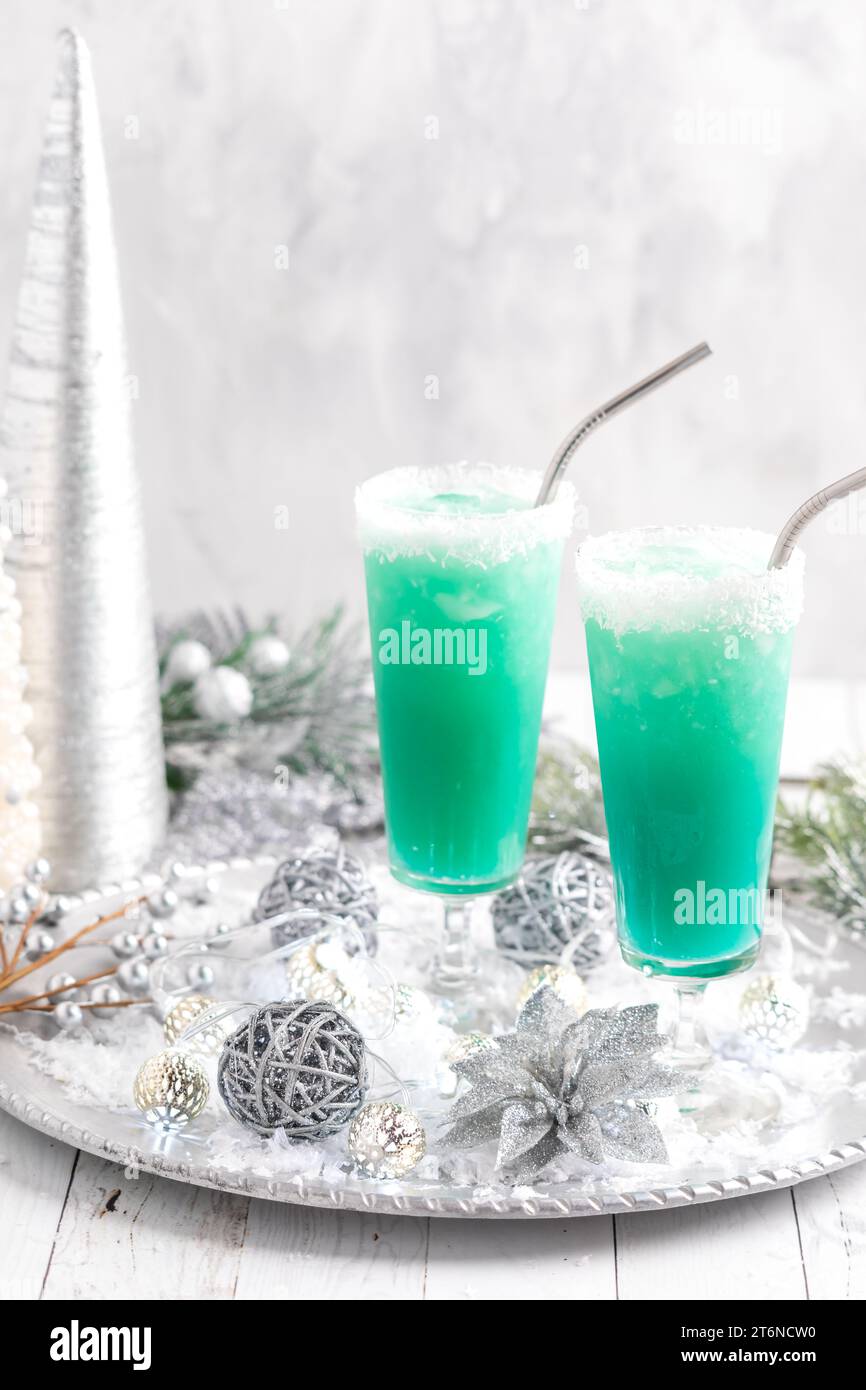 Icy cold Jack Frost cocktails on a silver tray with silver decorations ...