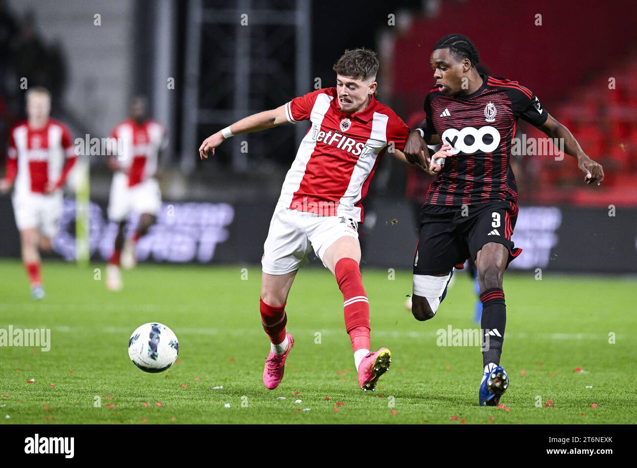 Antwerp's Arbnor Muja and Standard's Nathan Ngoy pictured in action ...