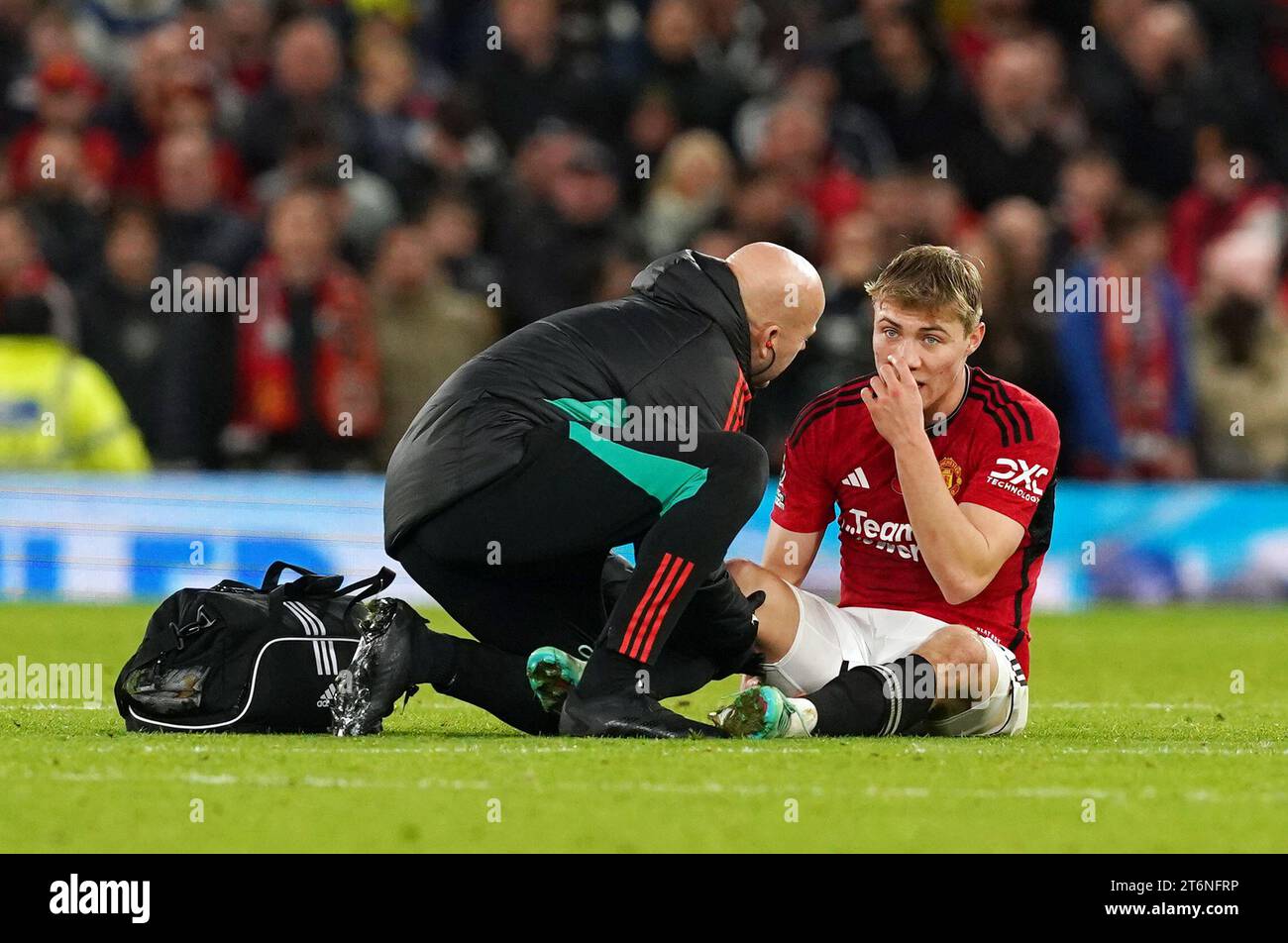 Manchester United's Rasmus Hojlund receives treatment for an injury ...