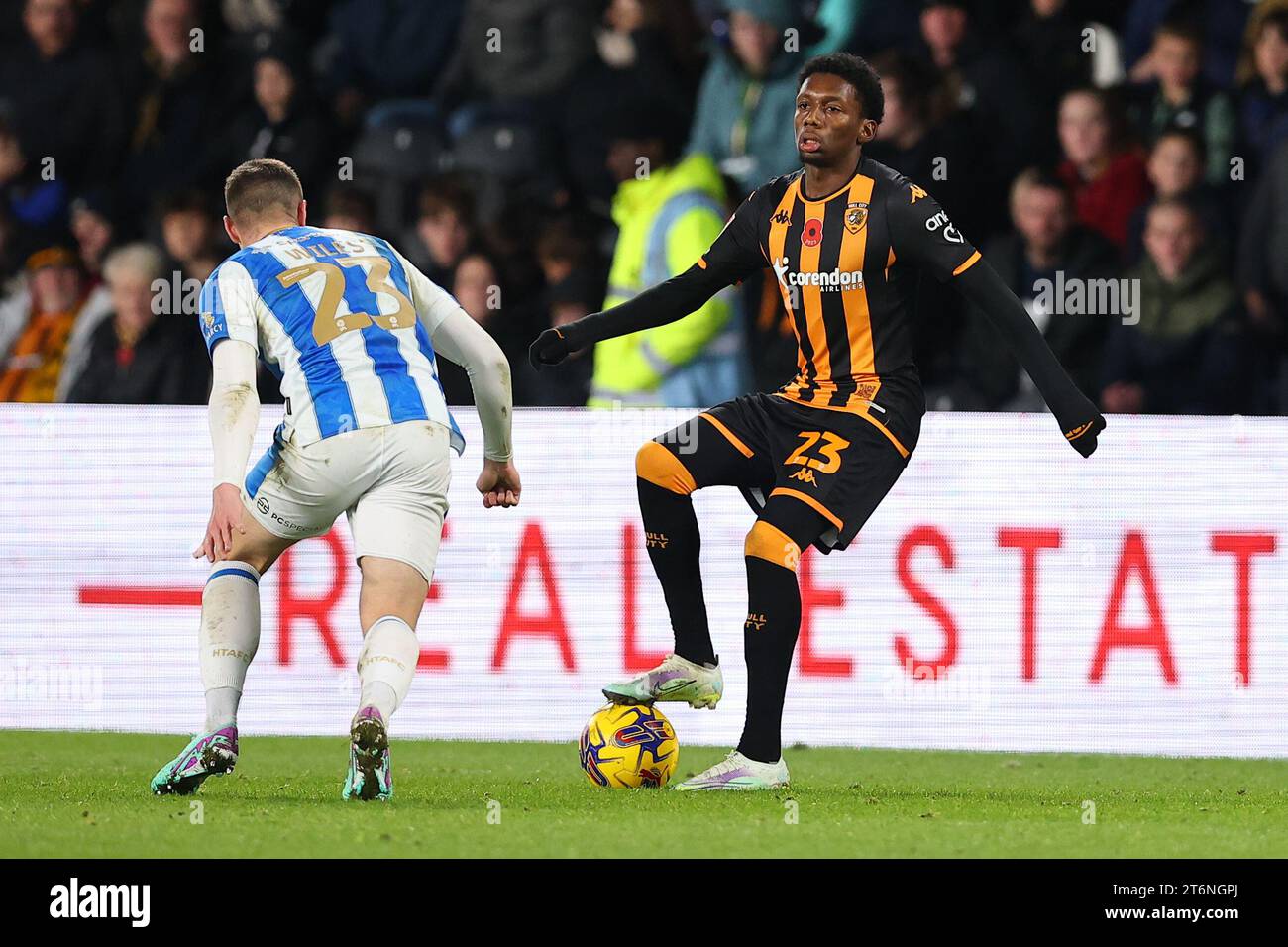 Jaden Philogene of Hull City looks to get past Ben Wiles #23 of ...