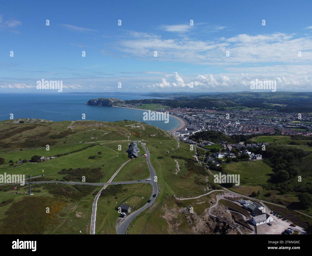 Drone over fields towards mountain hi-res stock photography and images - Alamy