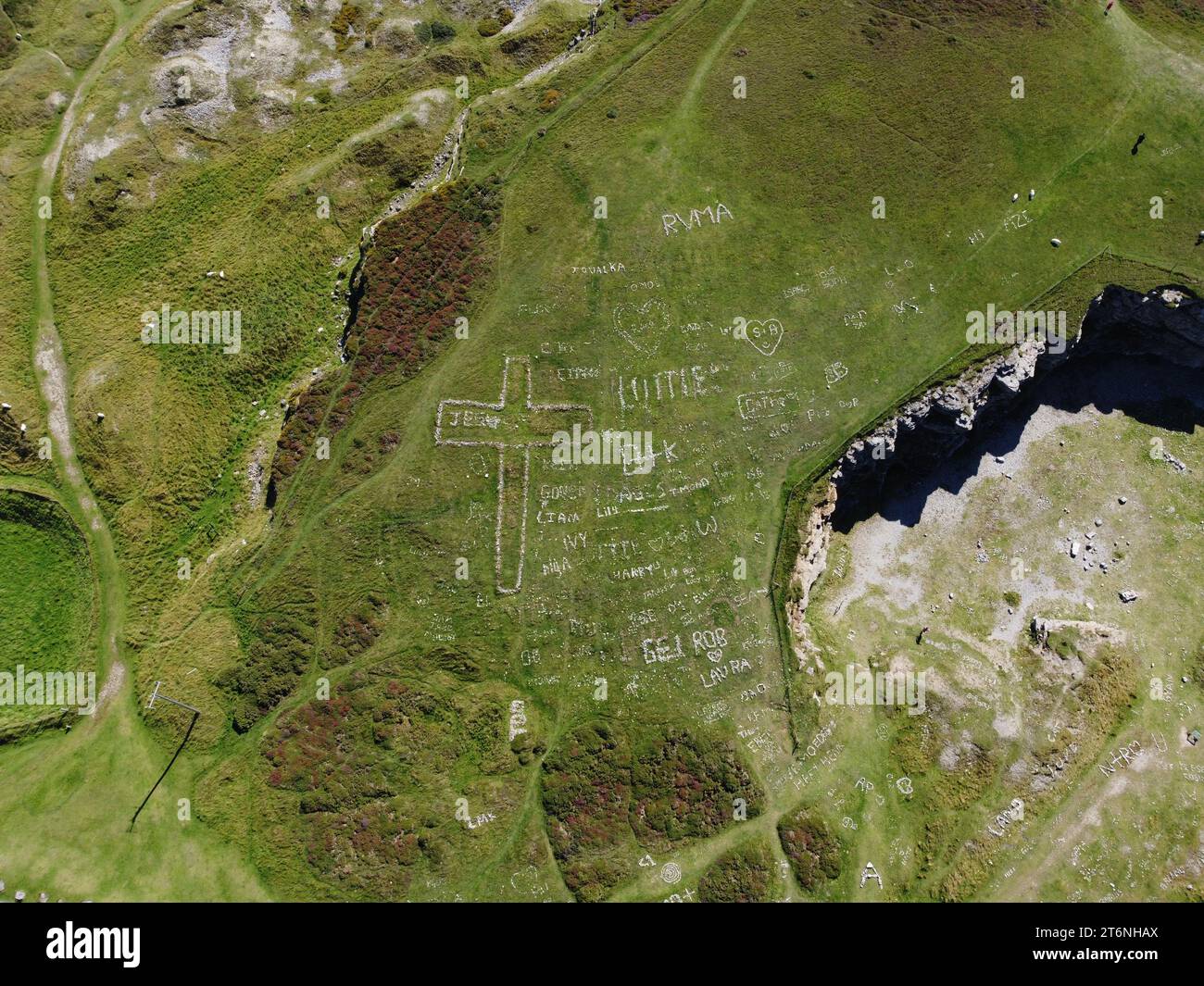 Aerial view of a crucifix and other messages and motifs laid out in stone by the Great Orme ...