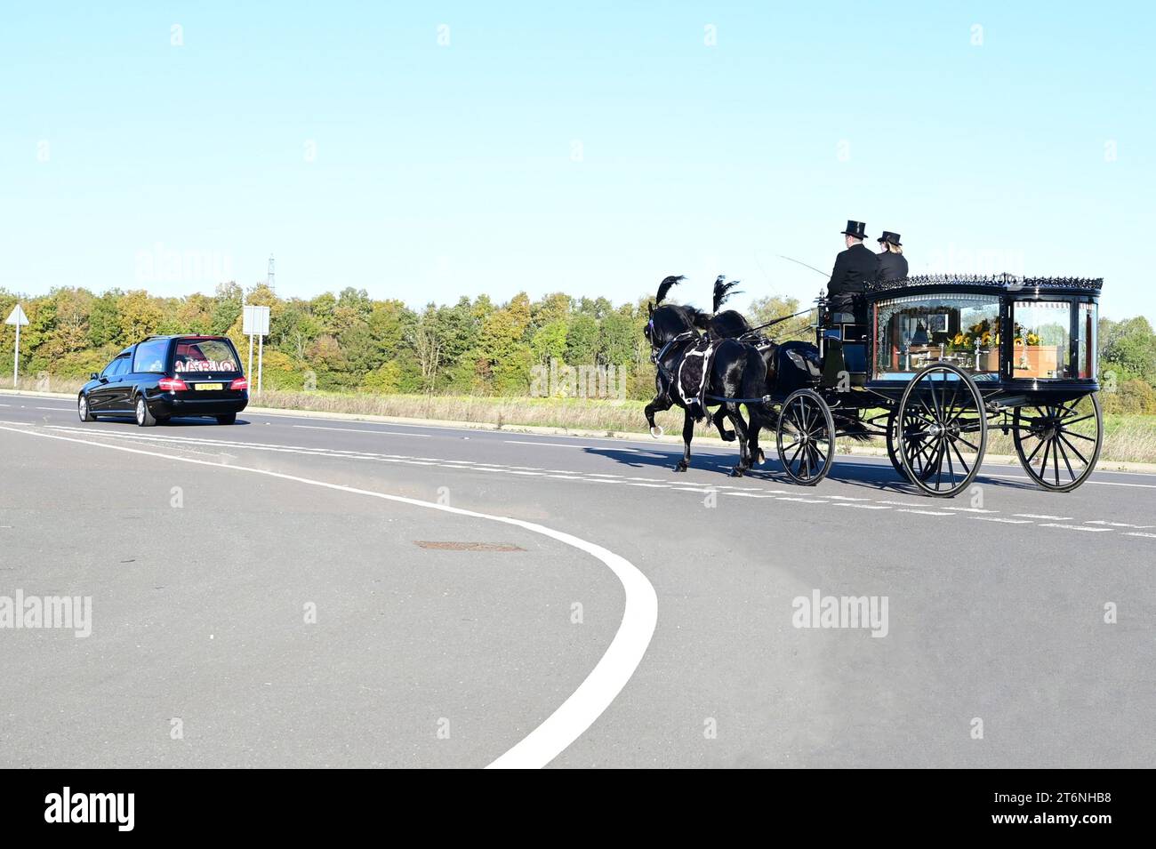 A horse drawn funeral carriage pulled by black horses Stock Photo - Alamy
