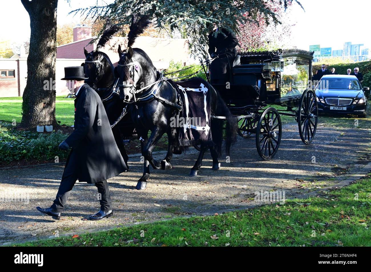 A horse drawn funeral carriage pulled by black horses Stock Photo - Alamy